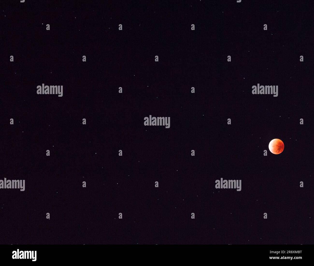 Close up picture of the blood moon during lunar eclipse at nighttime ...