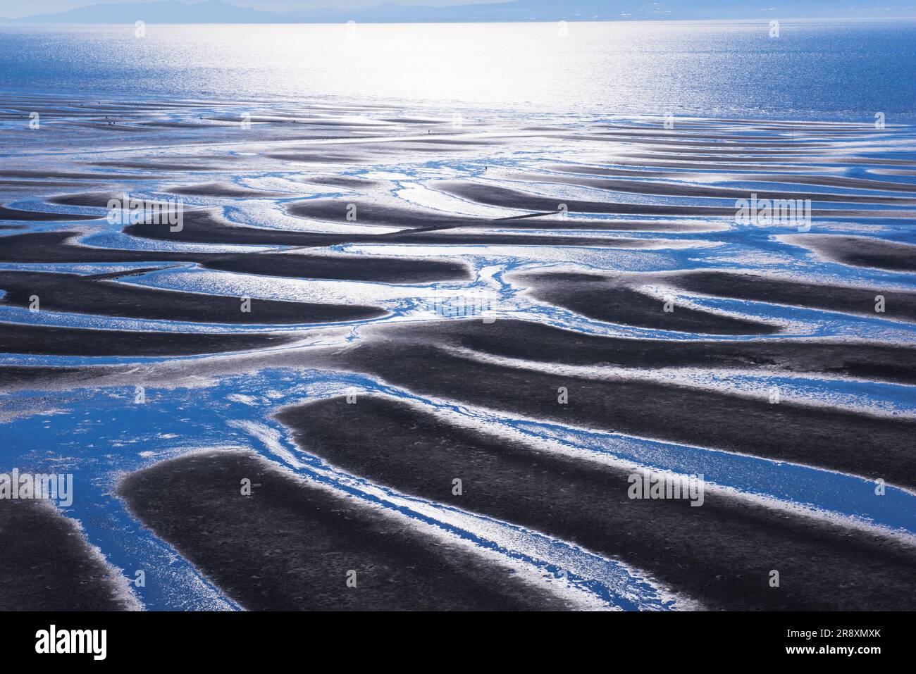 Mud flats on Mikoshiorai Coast Stock Photo - Alamy
