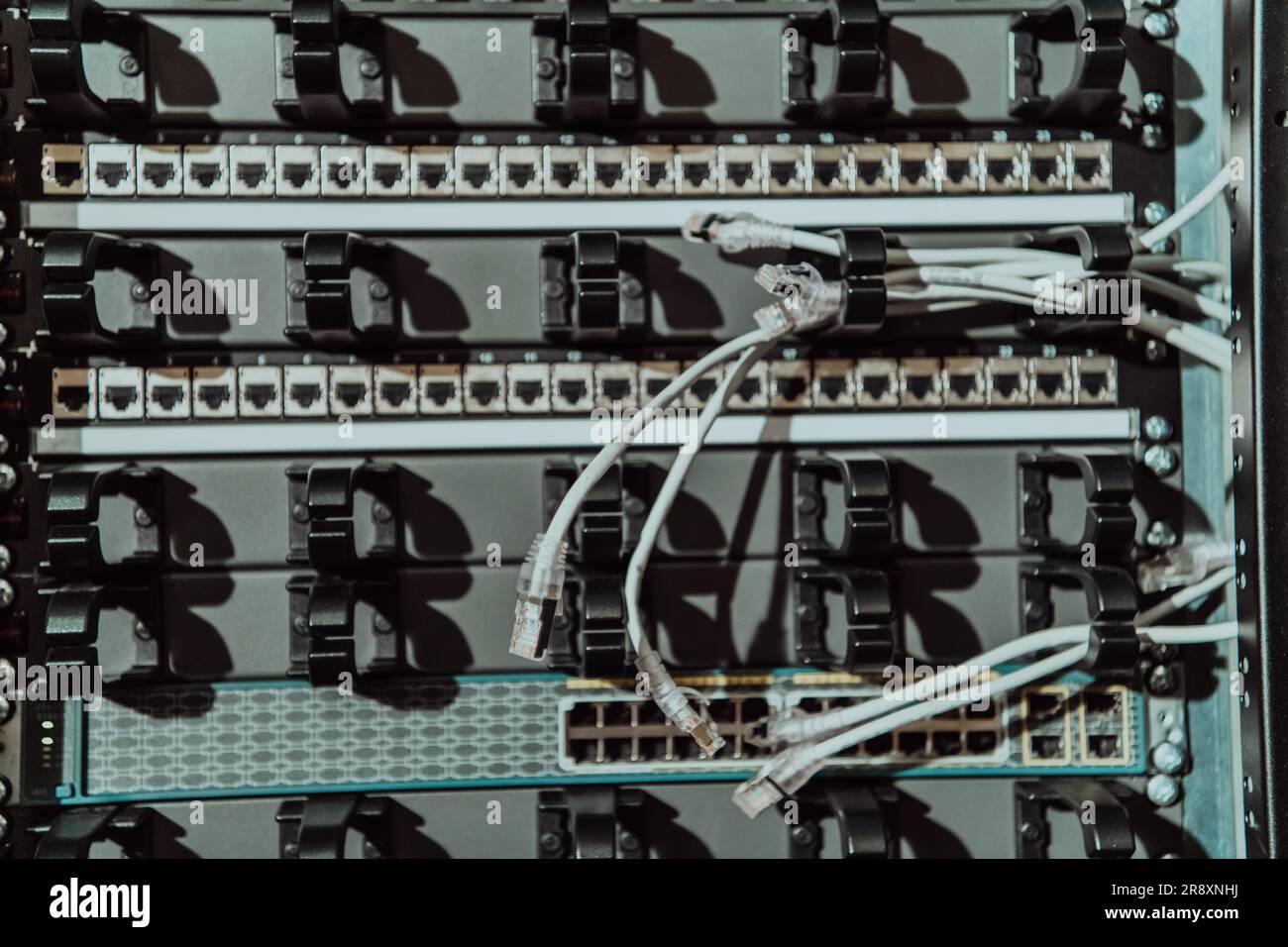 Close up of technician setting up network in server room Stock Photo ...