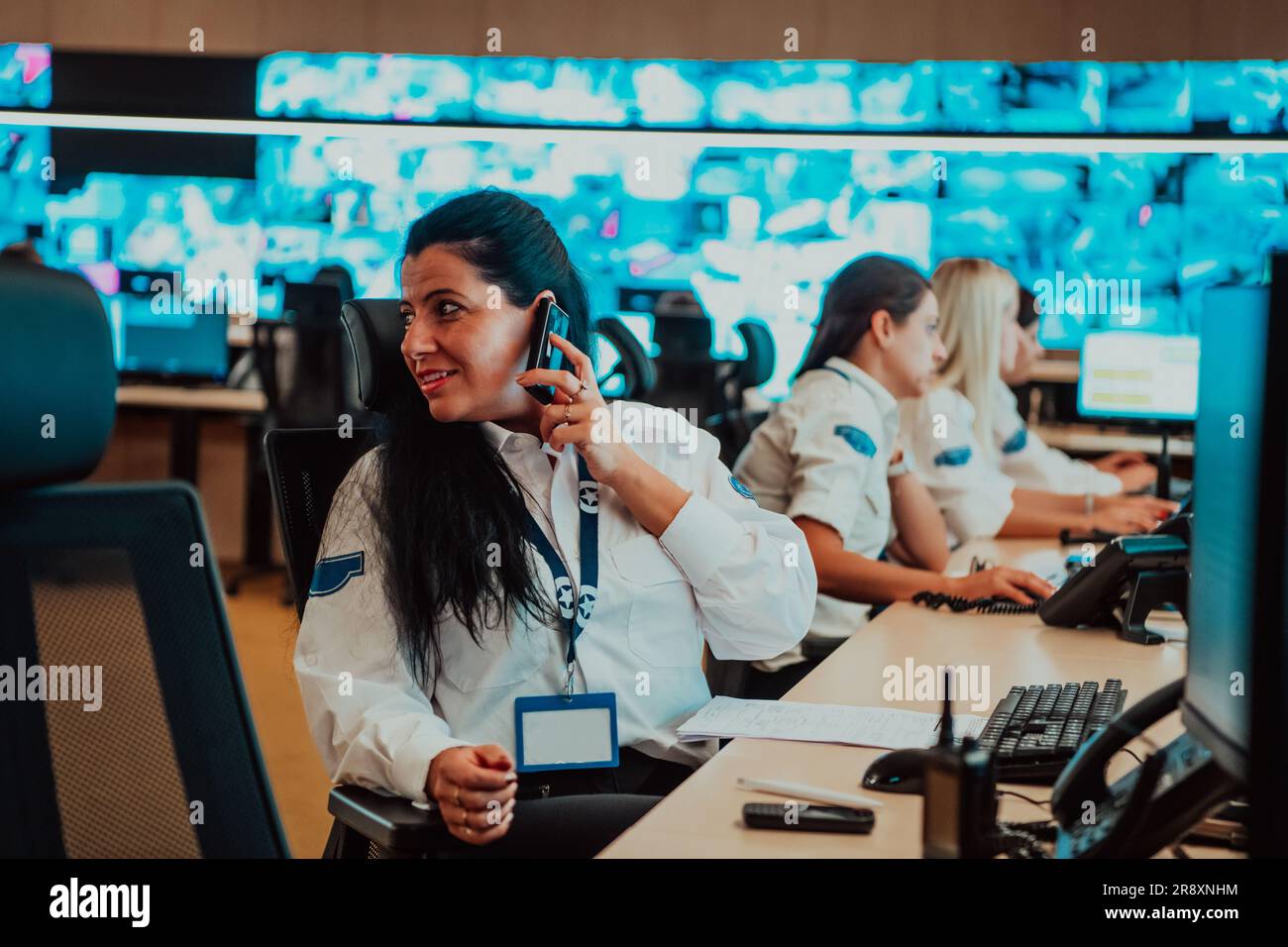 Group of Security data center operators working in a CCTV monitoring ...