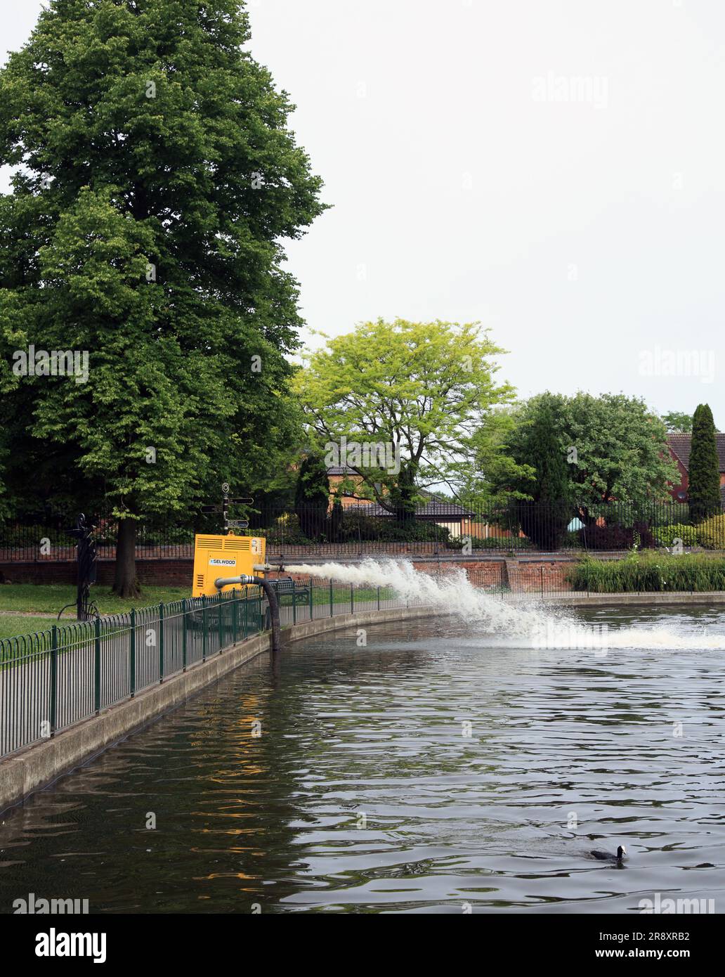 Pump aerating water in an ornamental pool during hot weather in 2023 ...