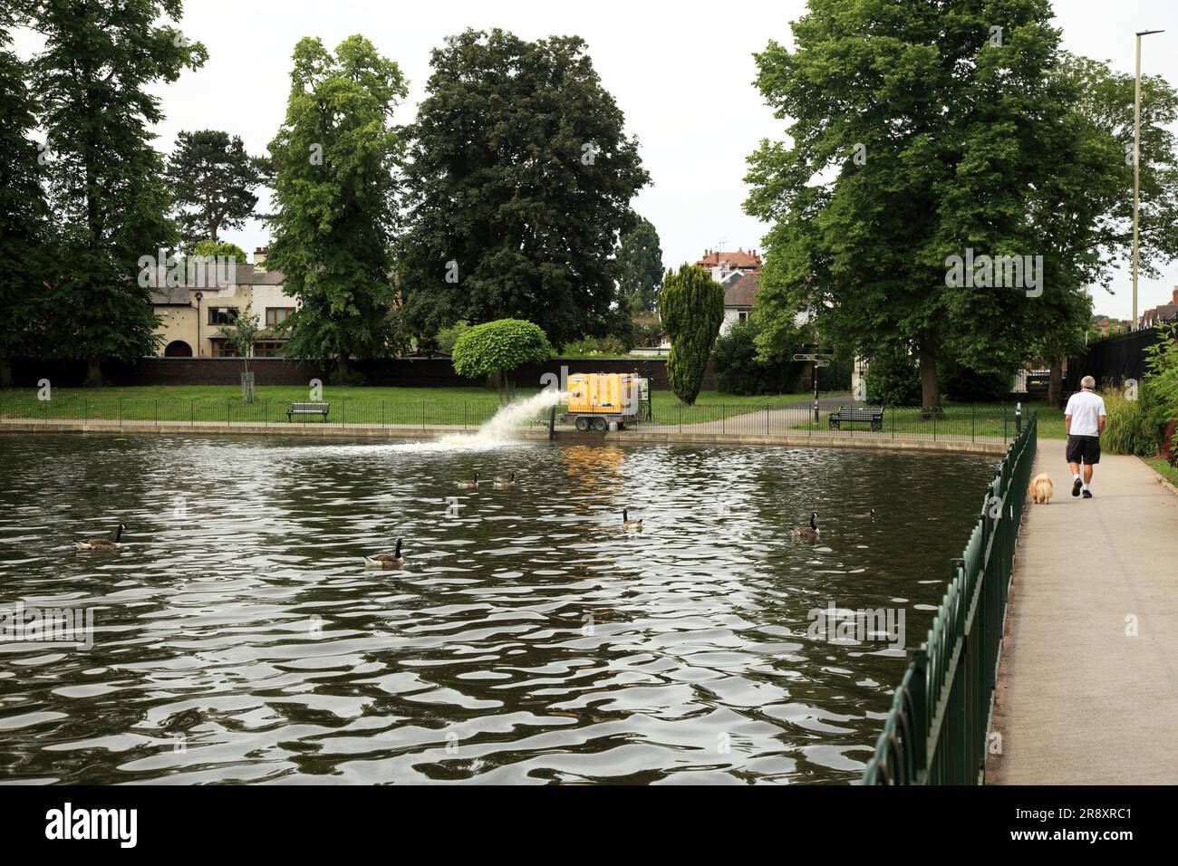 Pump aerating water in an ornamental pool during hot weather in 2023 ...