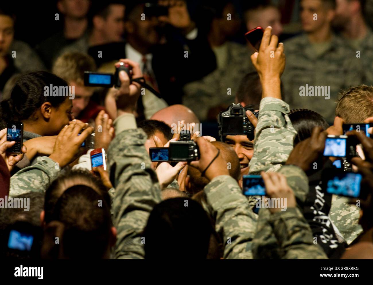 U.S. President Barack Obama smiles as he mingles with soldiers ...