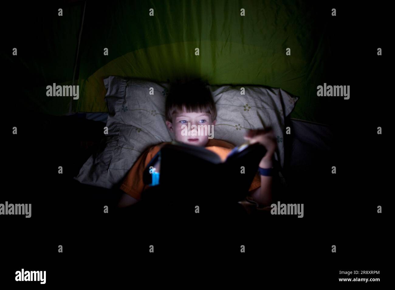 Boy camping tent night hi-res stock photography and images - Alamy