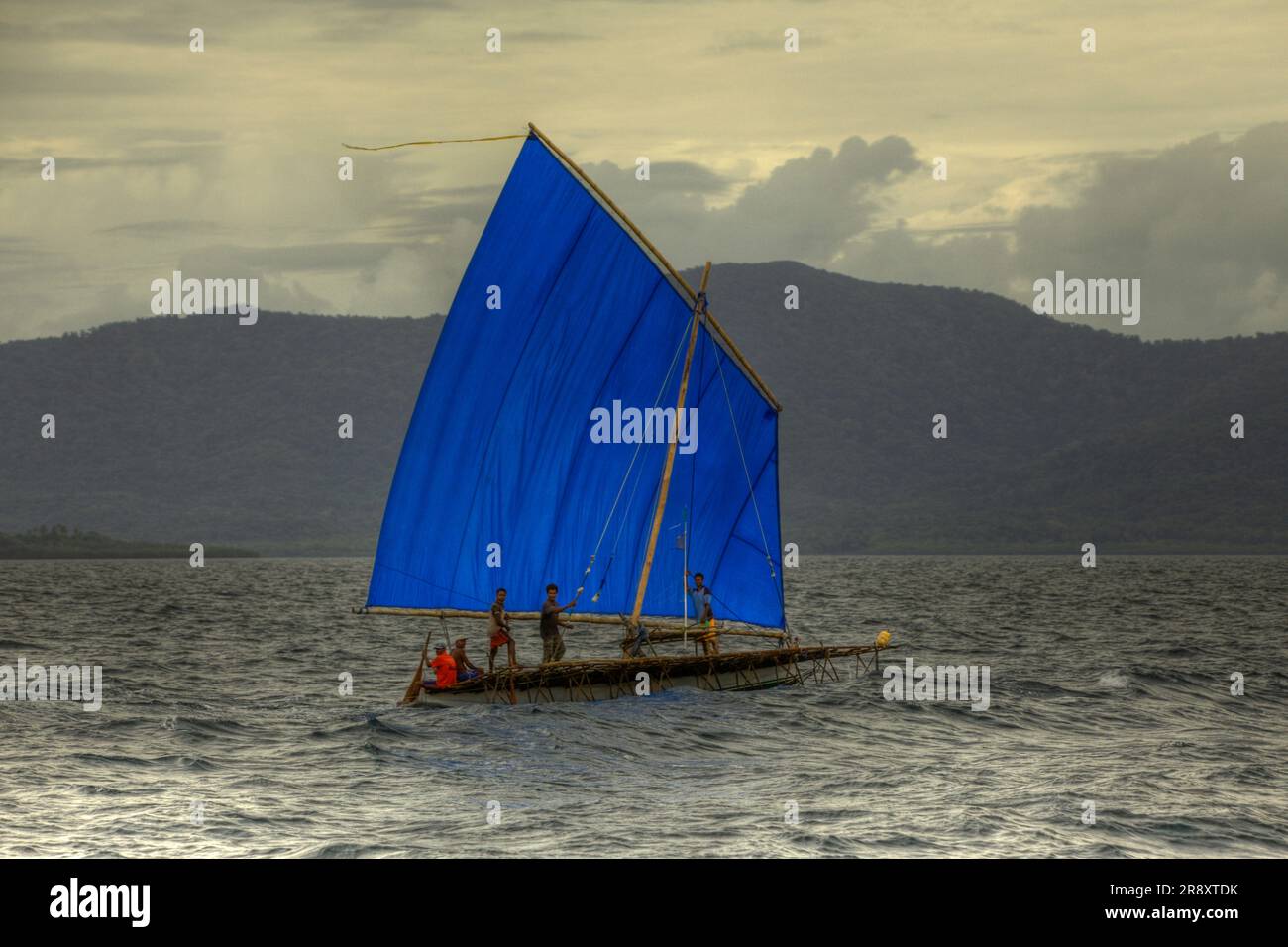Sailing outrigger at Nimoa Island in the Louisiades Archipelago, Papua ...