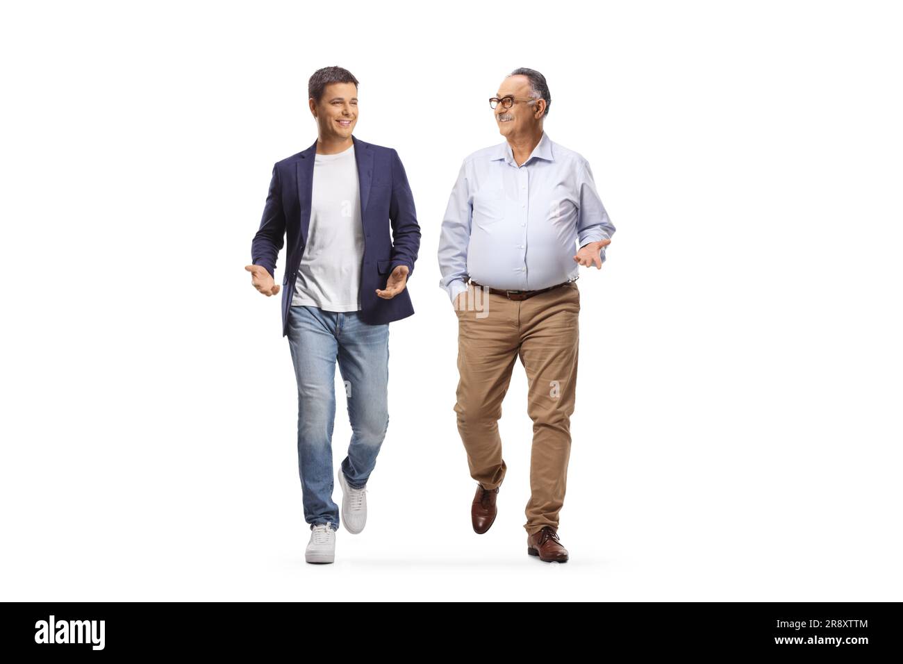 Happy young man walking and talking to an older male isolated on white background Stock Photo ...