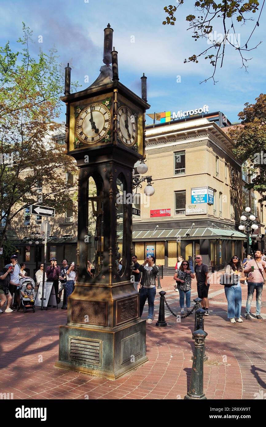 Steam powered clock overlooked by Microsoft sign in Gas Town downtown ...
