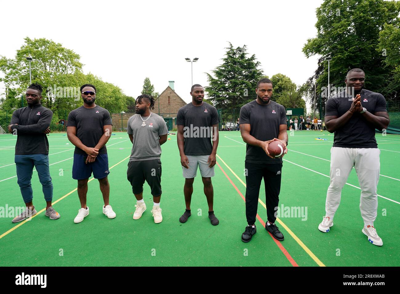 (L-R) Michael Gallup from the NFL team Dallas Cowboys, Josh Uche from ...