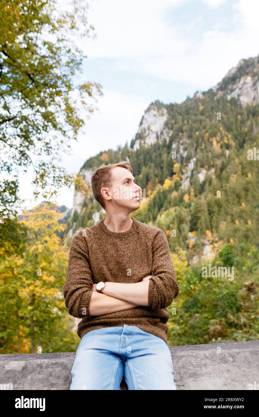 young tourist on alpine mountains and forests in Austria Stock Photo ...
