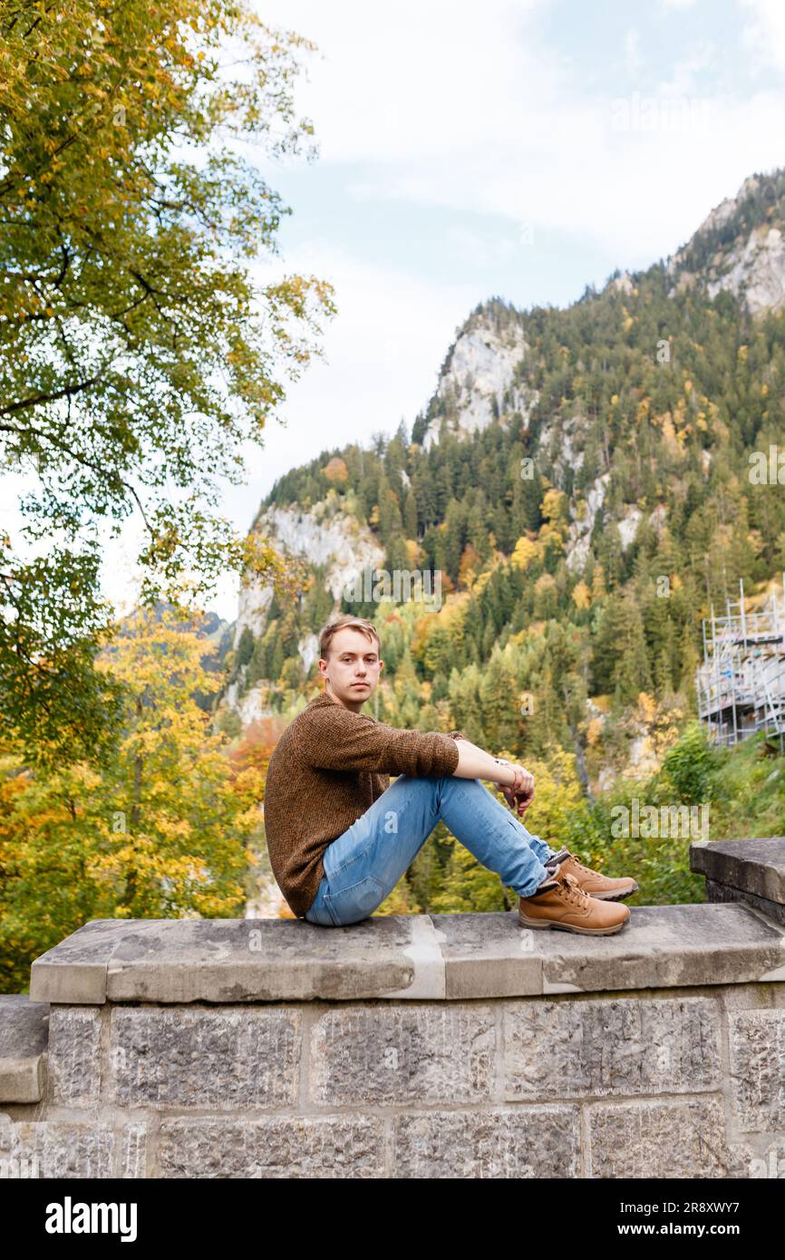 young tourist on alpine mountains and forests in Austria Stock Photo ...