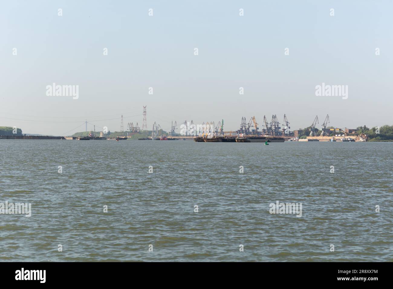 View on a modern industrial river- maritime port on the Danube river ...