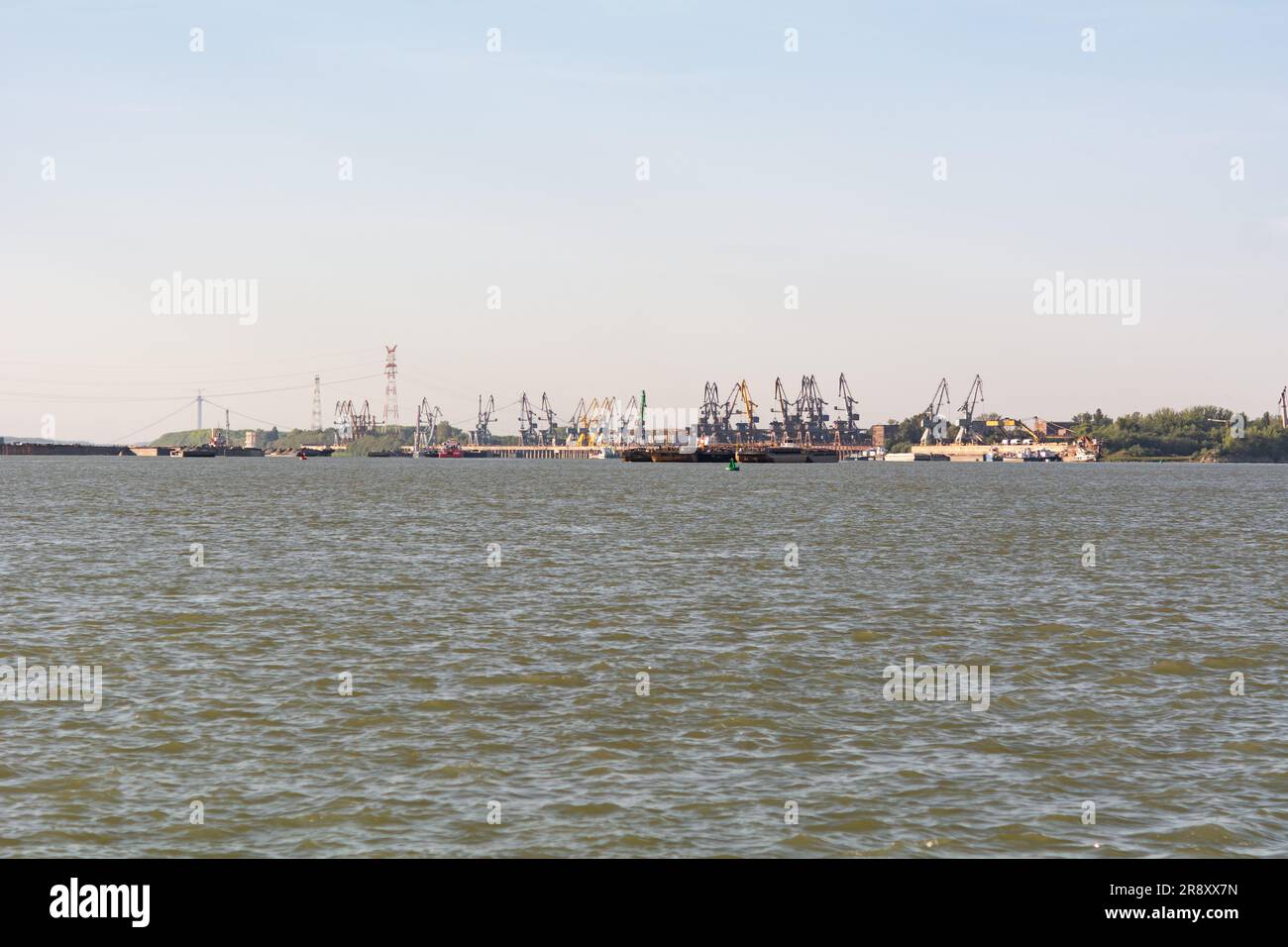 View on a modern industrial river- maritime port on the Danube river ...