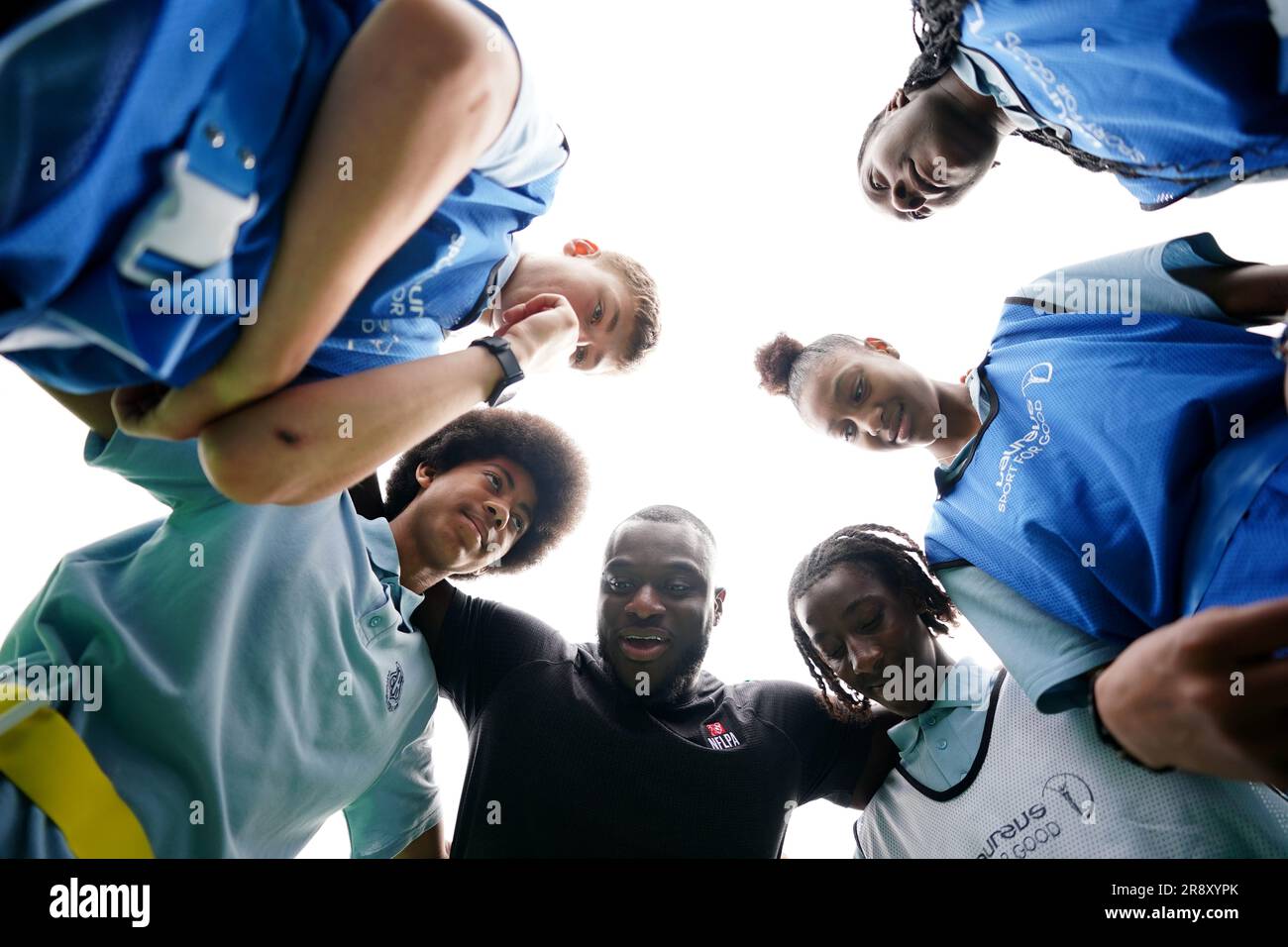 Efe Obada from the NFL team Washington Commanders interacts with ...