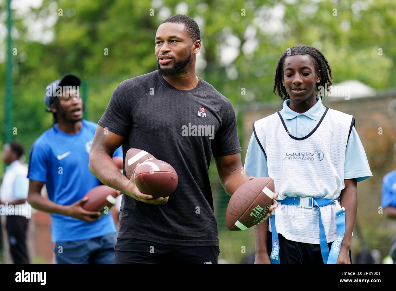 Kevin Byard from the NFL team Tennessee Titans coaches students during ...