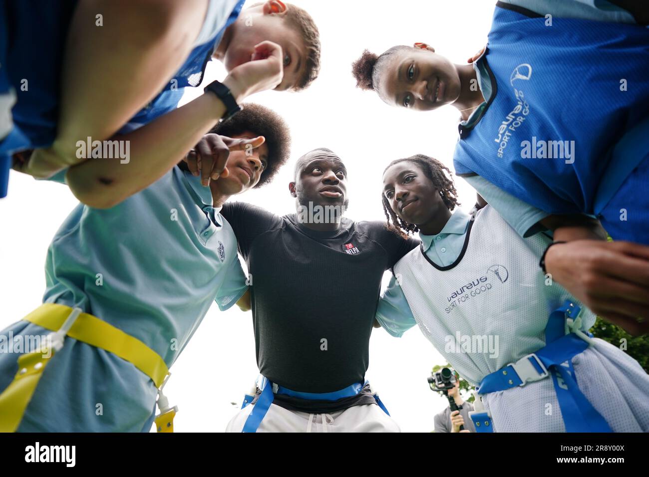 Efe Obada from the NFL team Washington Commanders interacts with ...