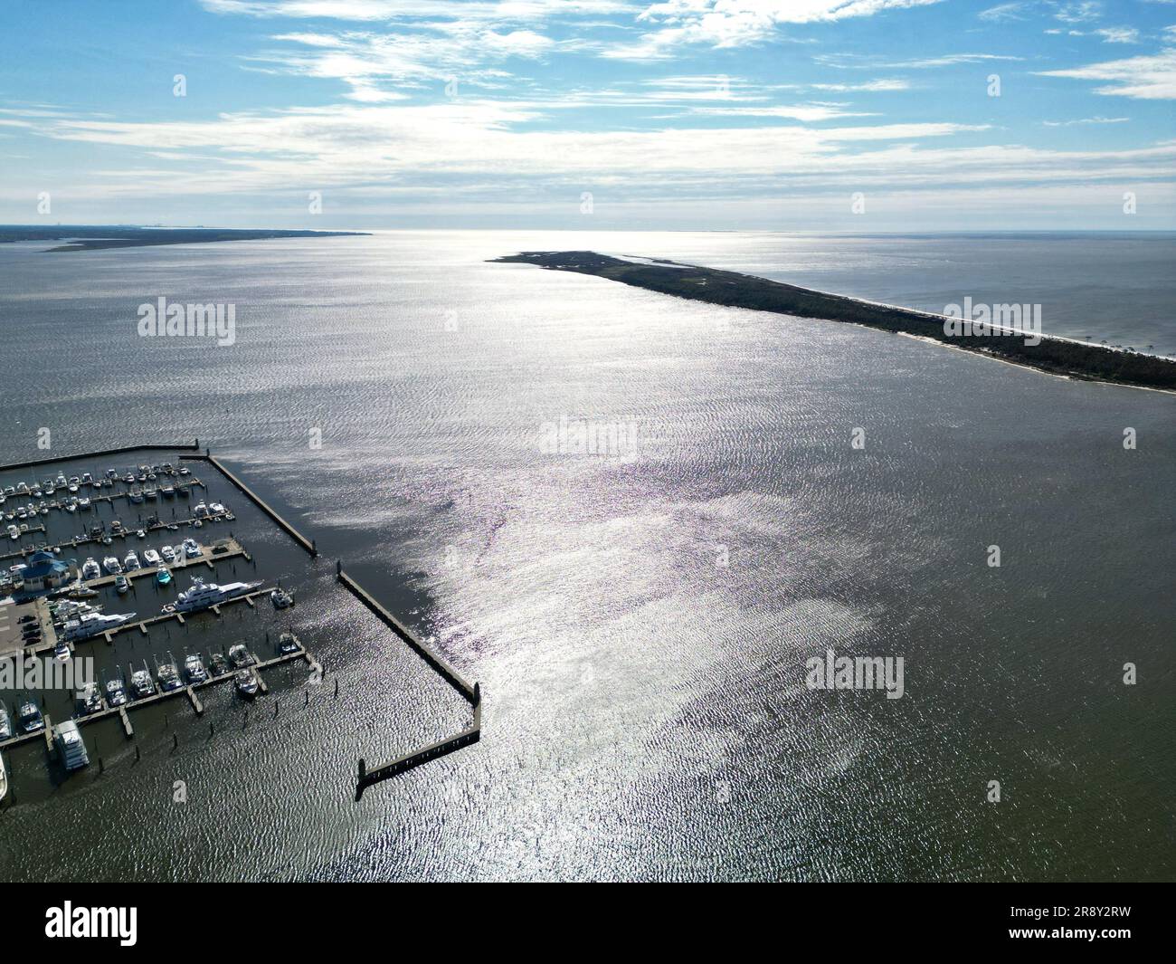 An aerial view of a breathtaking ocean, with the sun shining down on a ...