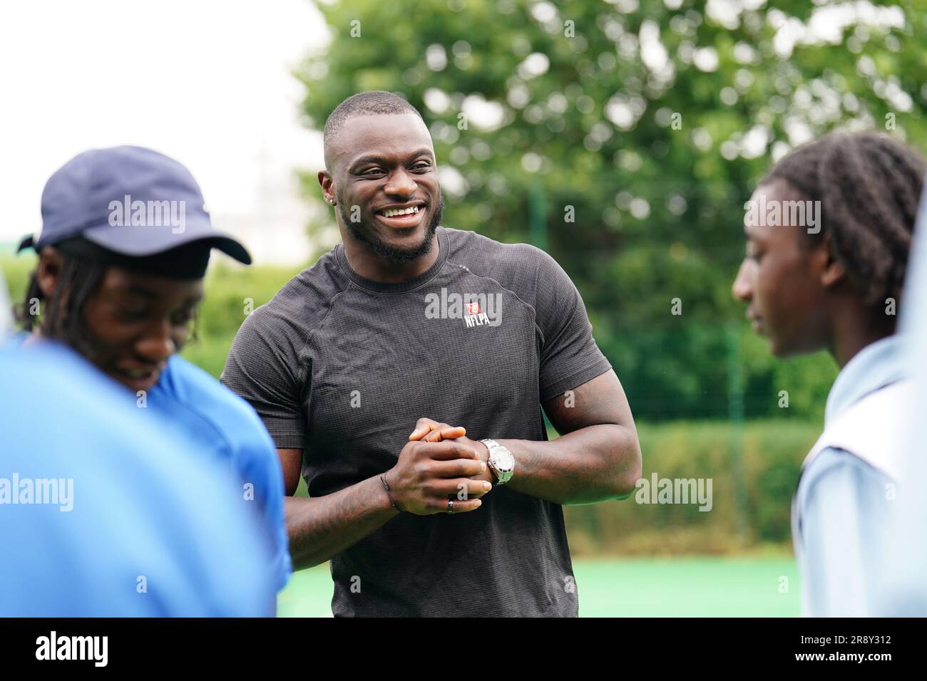 Efe Obada from the NFL team Washington Commanders interacts with ...