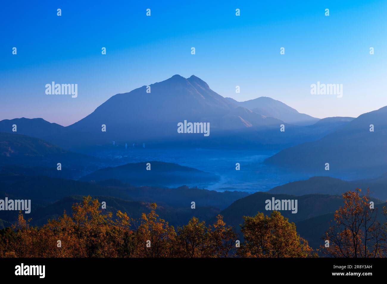 Yufuincho and Mount yufu in a morning mist Stock Photo - Alamy