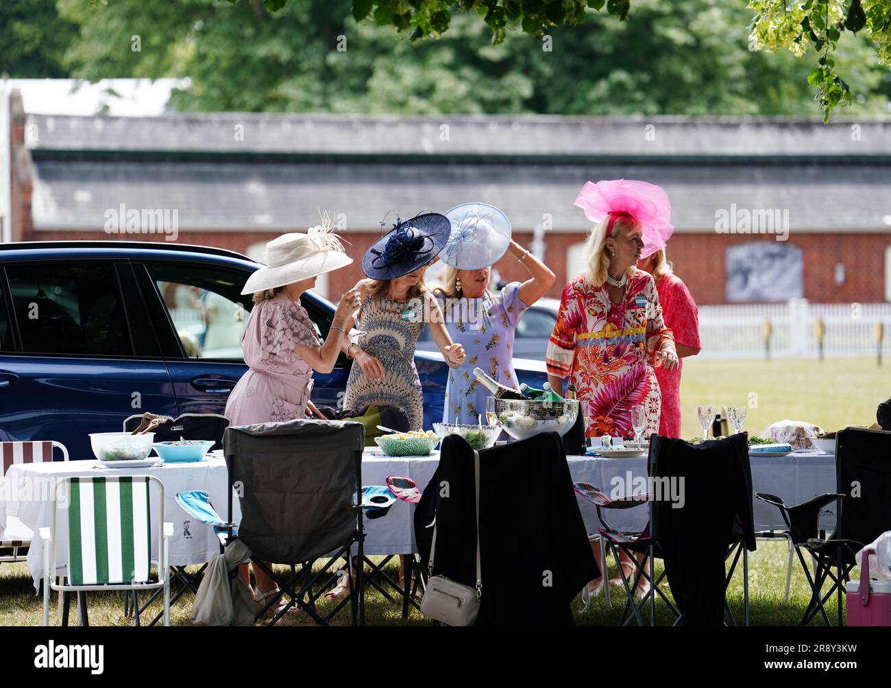 Racegoers enjoy a picnic in the Car Park during day four of Royal Ascot ...