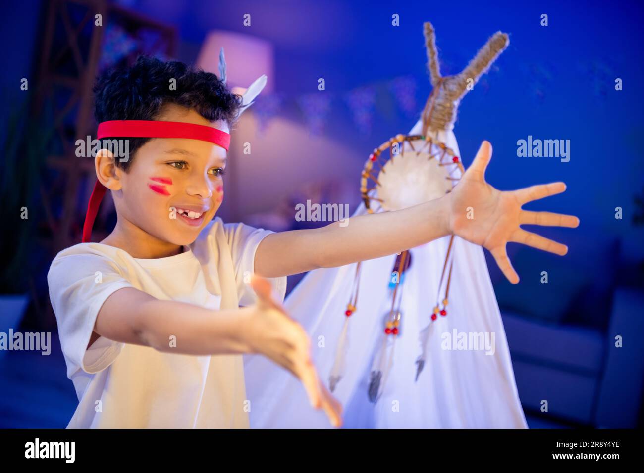 Photo of positive adorable kid invite friends for native indians ...