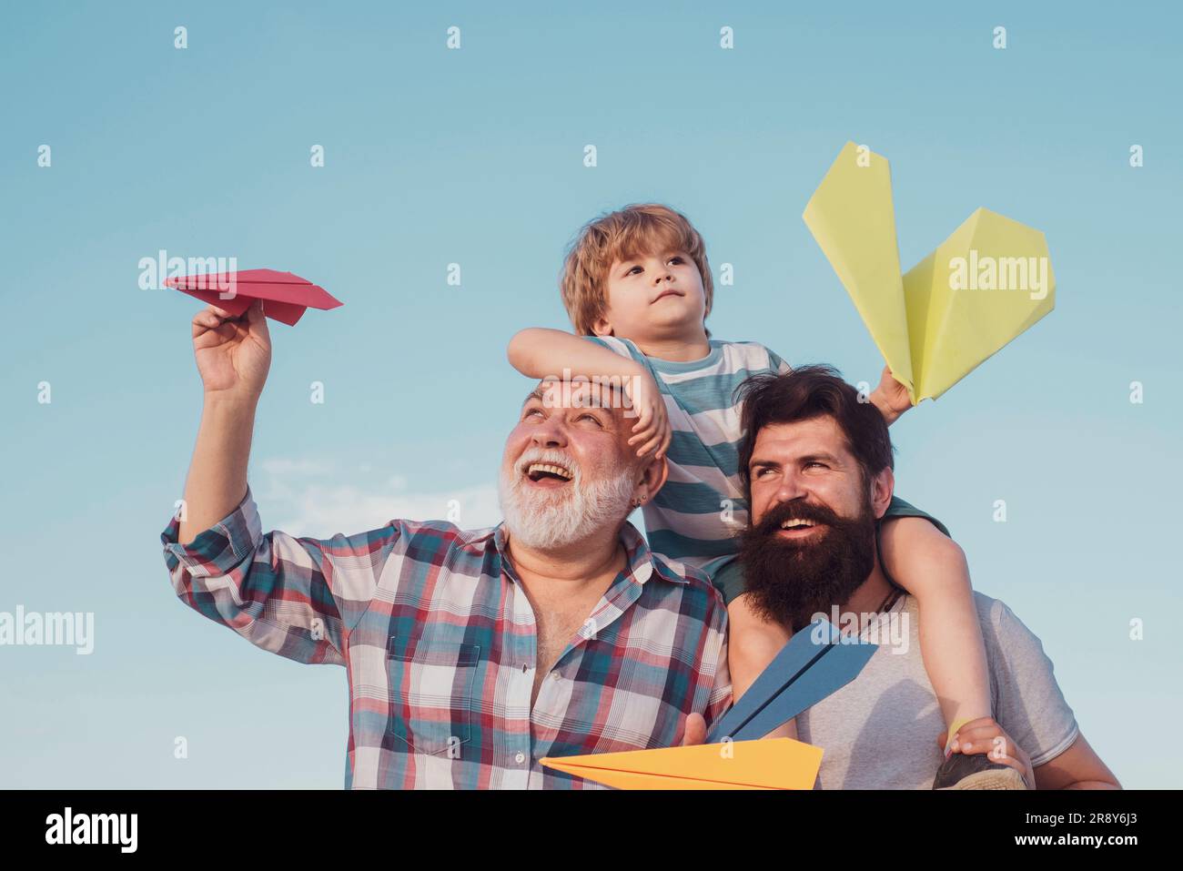Father and son enjoying outdoor. Dad and son. Father and son playing on ...