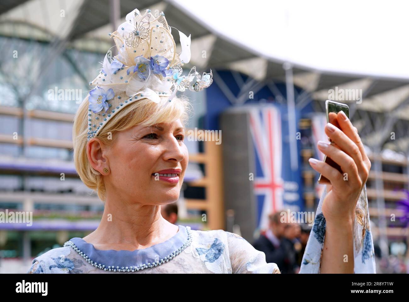 Lacry Puravu looks into a compact mirror during day four of Royal Ascot ...
