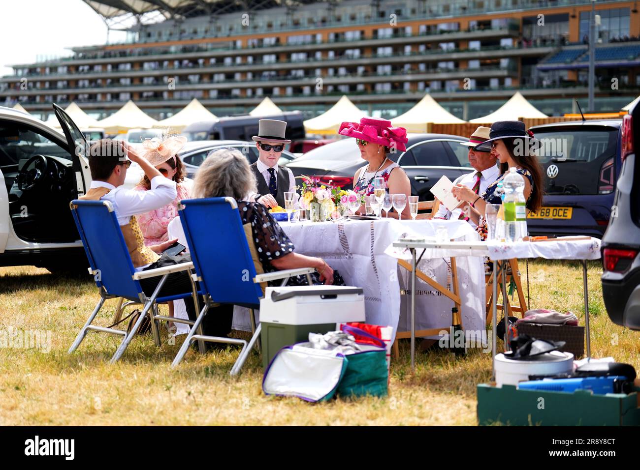 Racegoers enjoy a picnic in the car park during day four of Royal Ascot ...