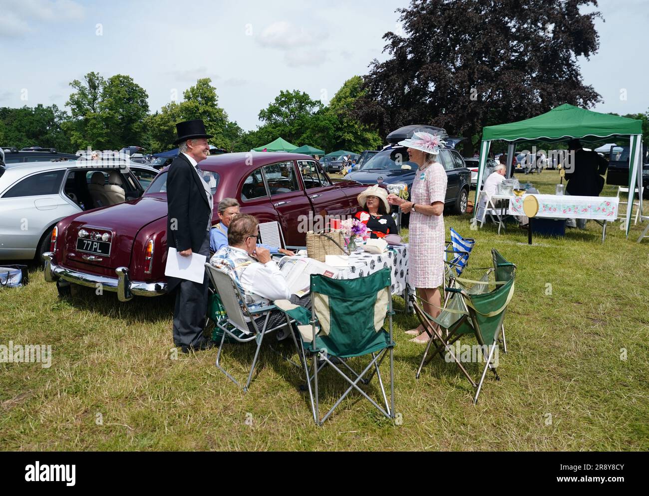 Racegoers enjoy a picnic in the Car Park during day four of Royal Ascot ...