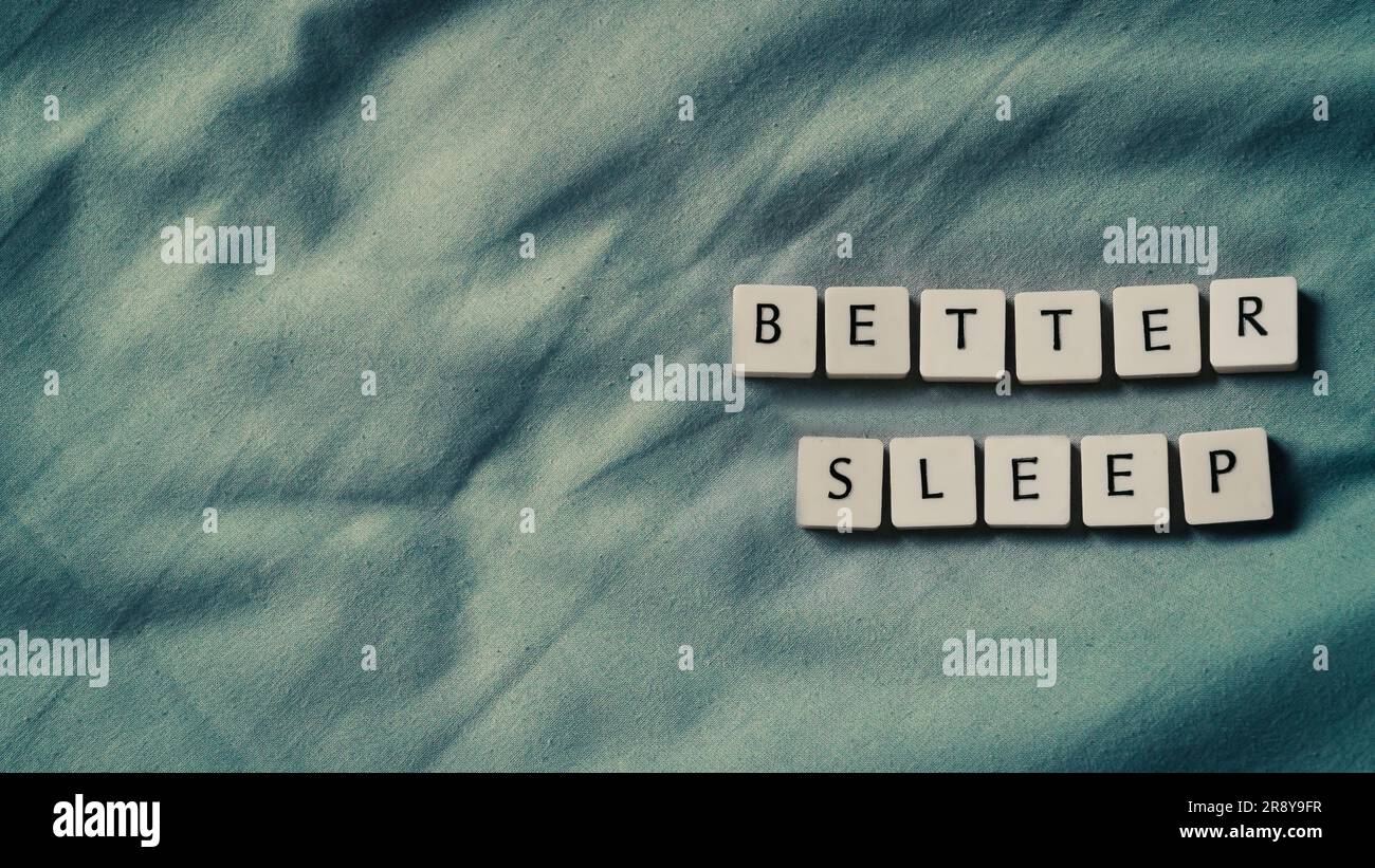Sleep concept. Better sleep words on bed. Sleep health concept. High ...