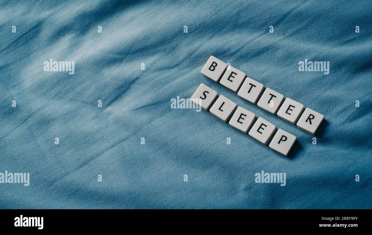 Sleep concept. Better sleep words on bed. Sleep health concept. High ...