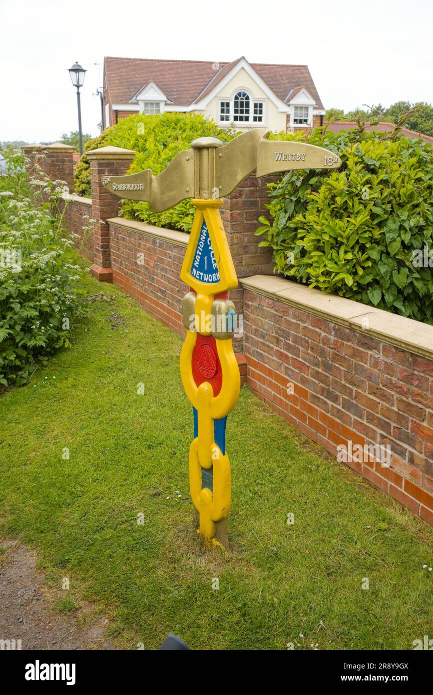 Directional signpost on the National Cycle Network route 1 at Burniston ...