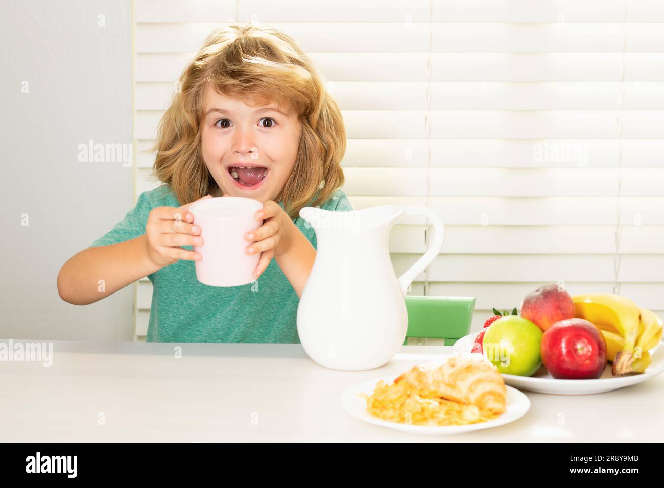 Child eating meal. Healthy nutrition for children. Cute boy enjoy ...