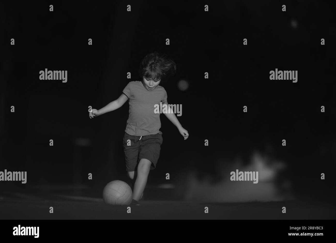 Kid playing soccer, happy child enjoying sports football game, kids ...