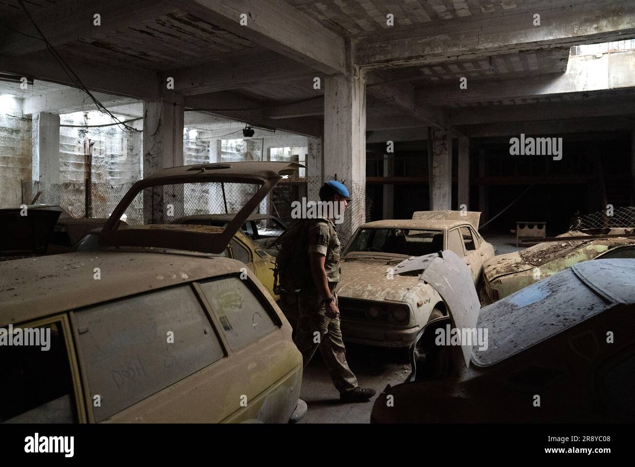 Soldiers from the Household Cavalry carry out a patrol through an ...