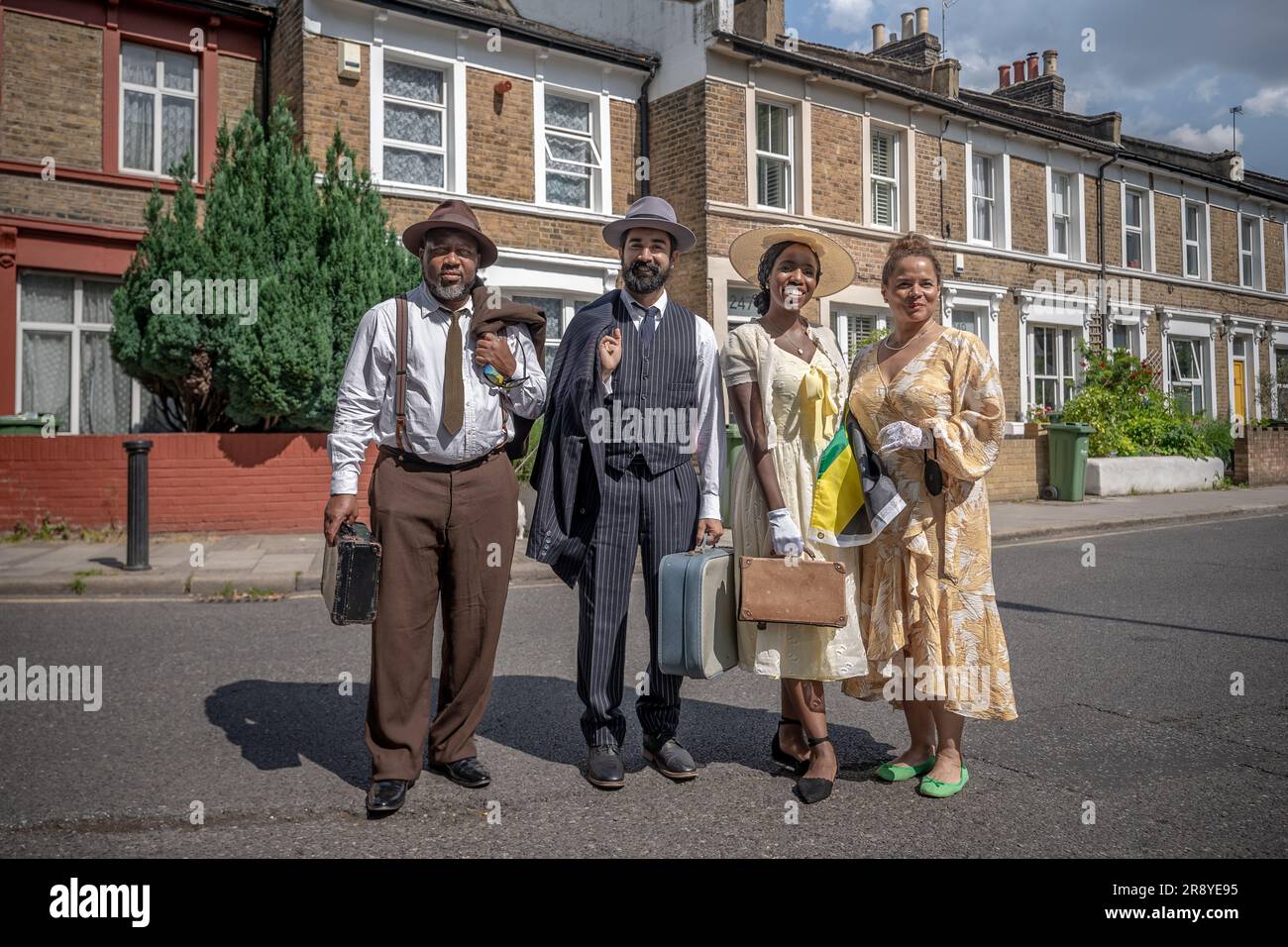 London, UK. 22nd June 2023. Windrush 75: Procession. Locals get ...