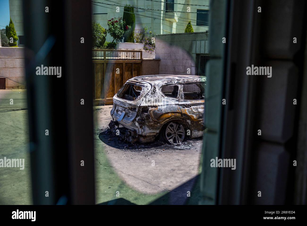 Turmusaya, Palestinian Territories. 23rd June, 2023. A burned car can ...