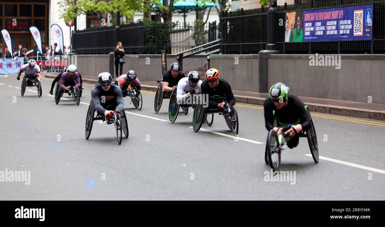 The Chasing group, of the Men's Elite Wheelchair Race, passing through ...