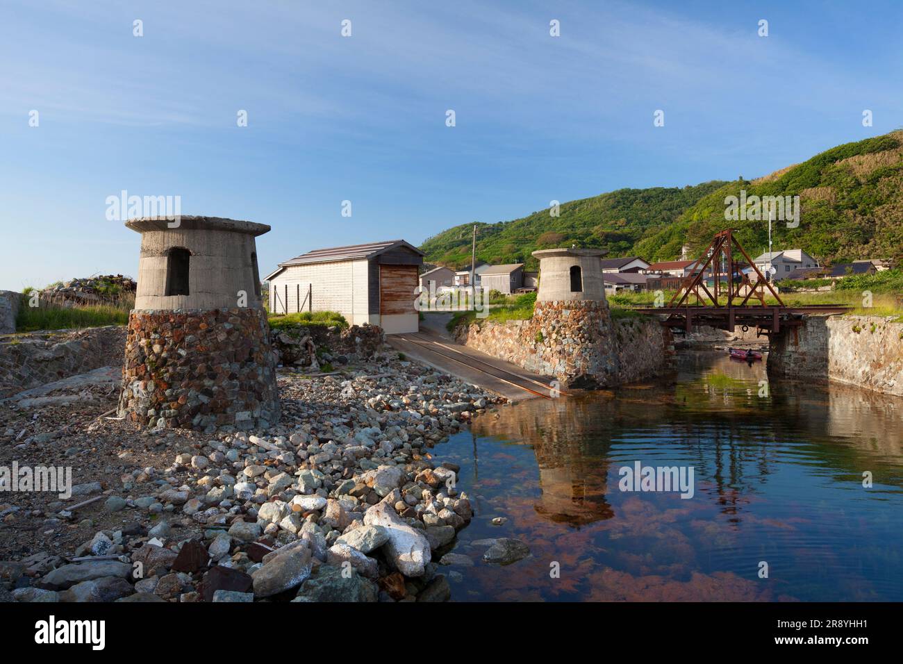 Sado gold mine Oma Port Truss bridge and crane pedestal Stock Photo - Alamy