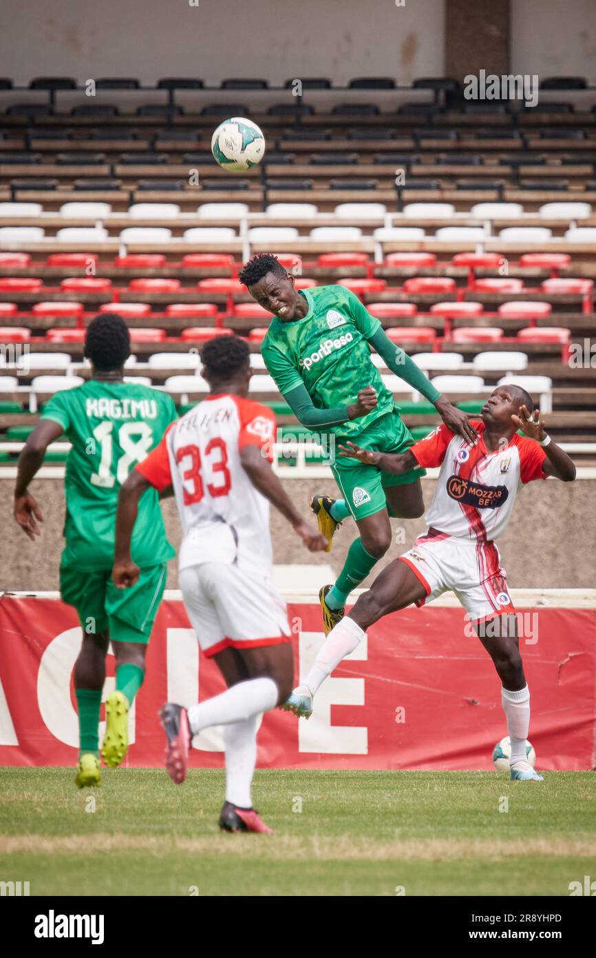 Nairobi, Kenya. 21 Jun 2023. Dennis NGANGA (DF, Gor Mahia) leaps to clear the ball. Gor Mahia v ...
