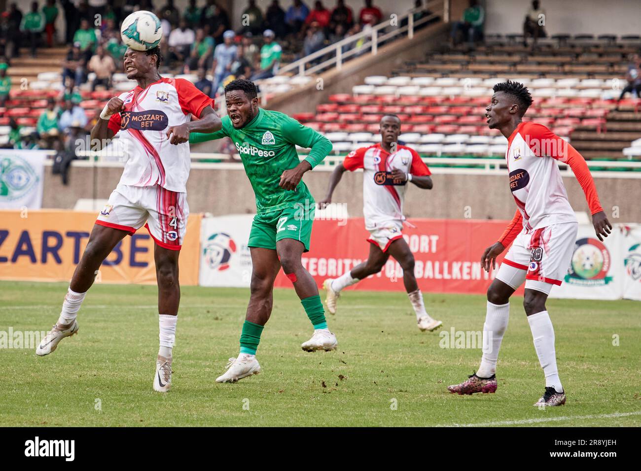 Nairobi, Kenya. 21 Jun 2023. A Kakamega Homeboyz player intercepts the ball just before it ...