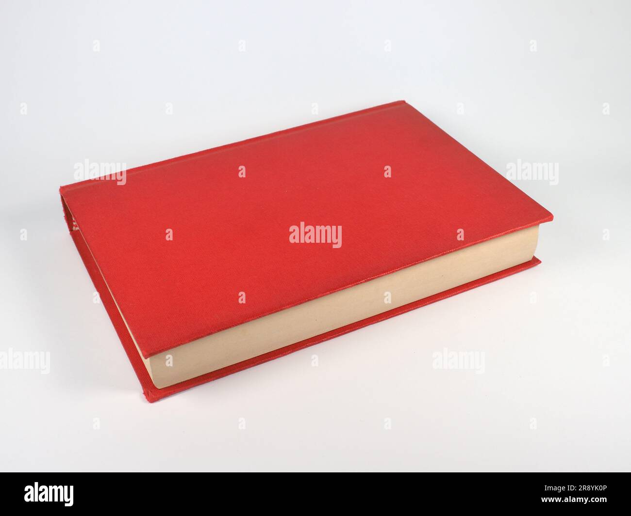 closed red book over off white background with copy space Stock Photo ...