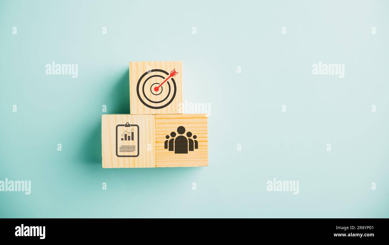 Wooden block cude step on table with Action Plan Stock Photo - Alamy