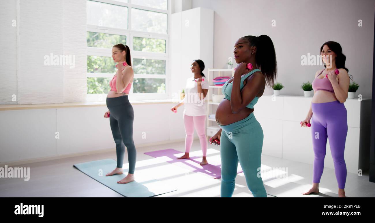 Diverse Pregnant Group Gym Fitness Exercise And Prenatal Training Stock ...