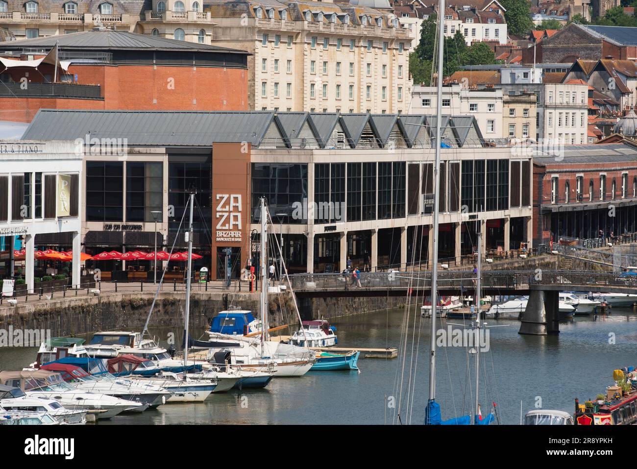 Boats moored by restaurants in the floating harbour in city centre of ...