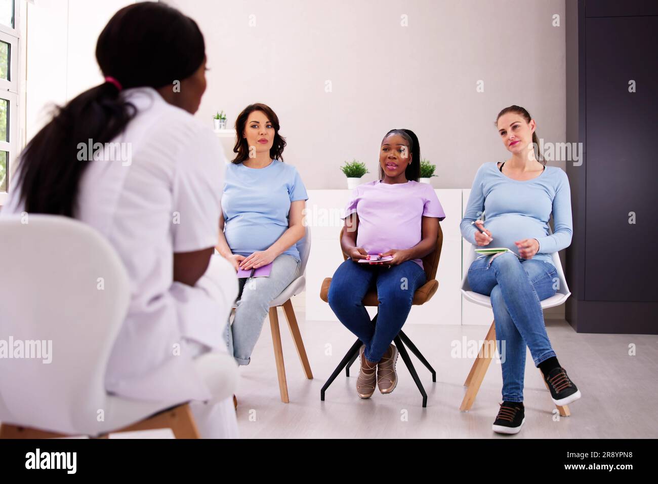 Prenatal Trainer Class. Young Women Pregnancy And Parenthood Stock ...