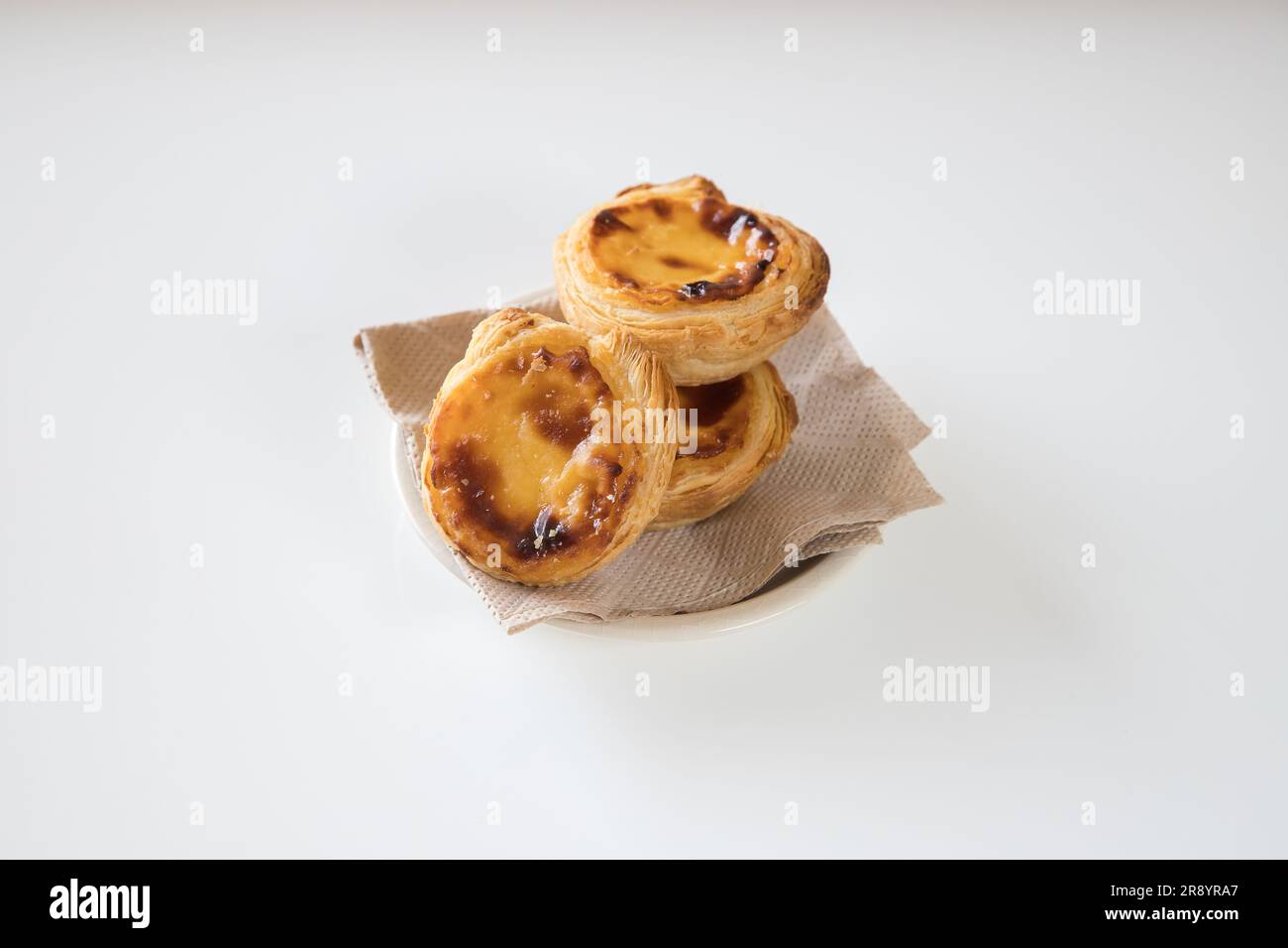 Pasteis de nata, traditional sweet of Portuguese cuisine. Small crunchy ...