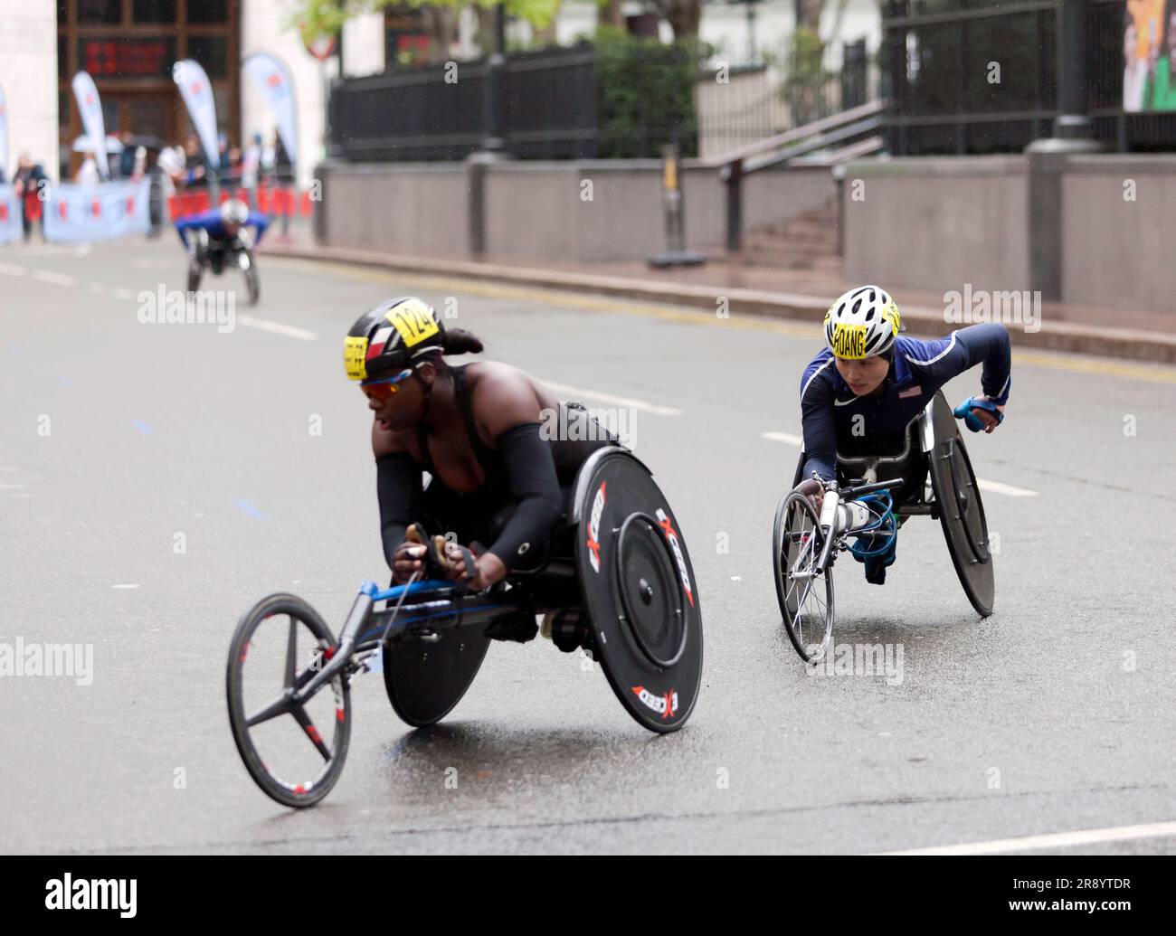 Michelle Wheeler (USA) and Yen Hoang (USA) passing through Cabot Square ...