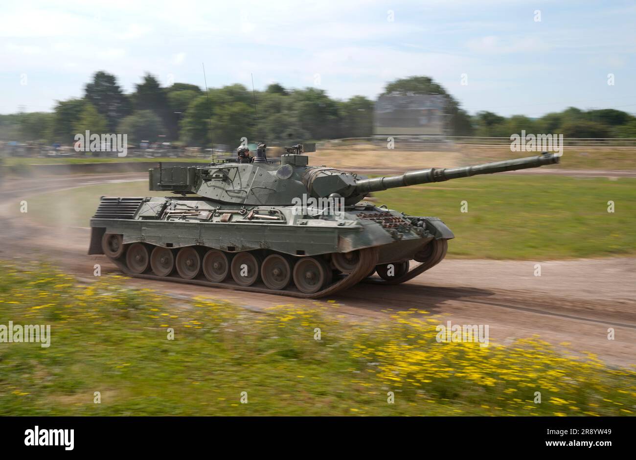 A Leopard tank is driven around the Kuwait Arena during day one of ...