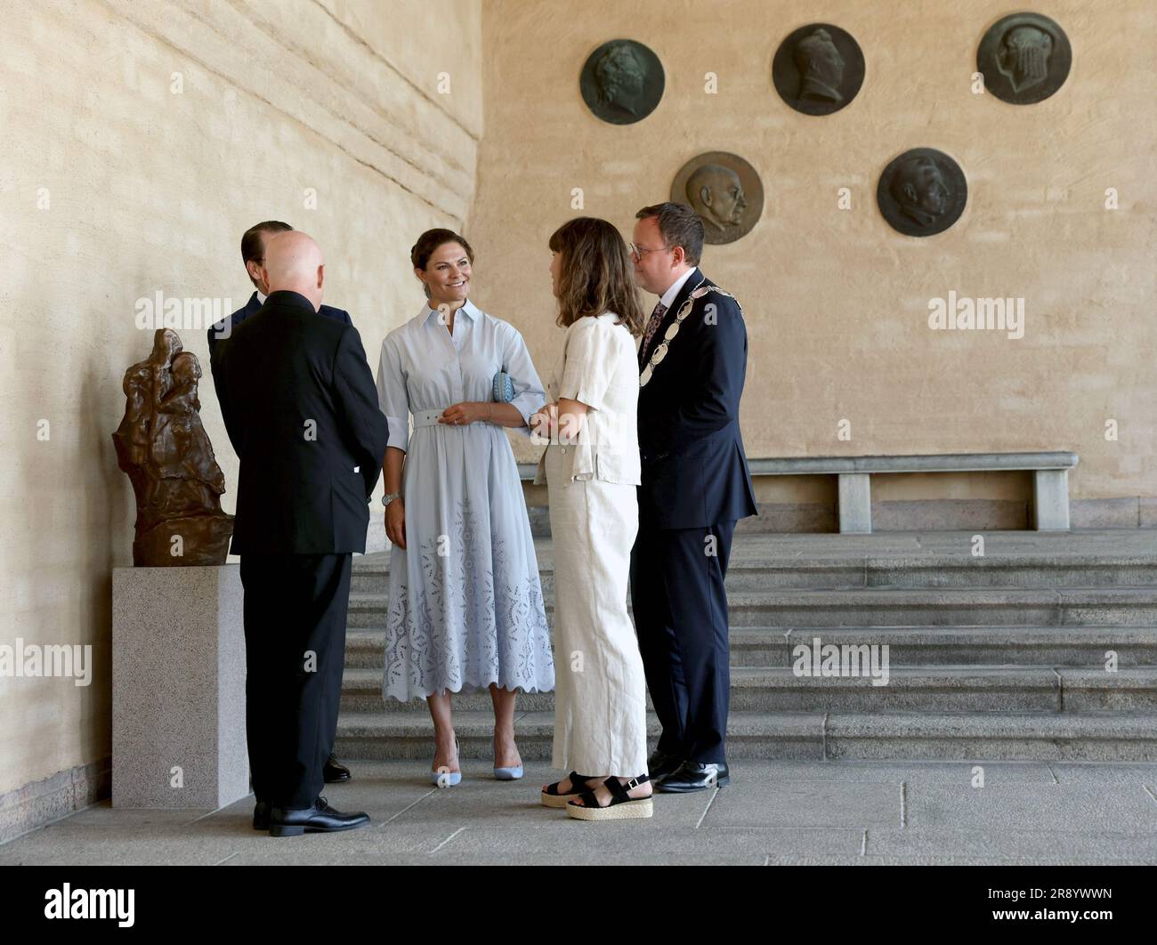Crown Princess Victoria talks to the artist Stina Persson at the ...