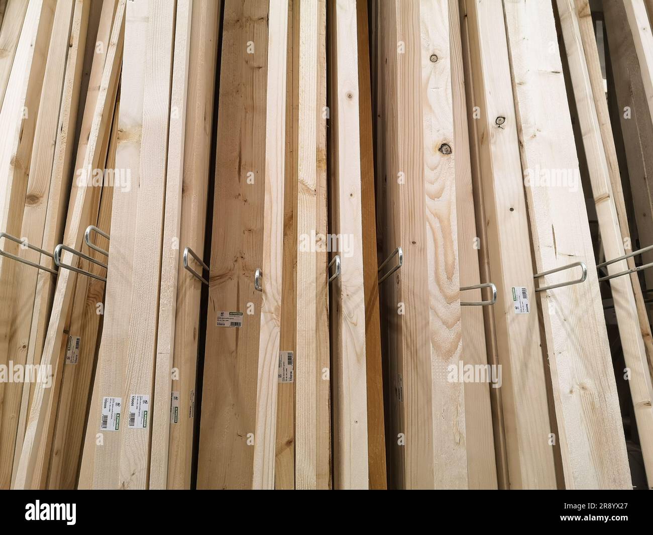 An arrangement of wooden boards of assorted sizes and shapes, organized ...